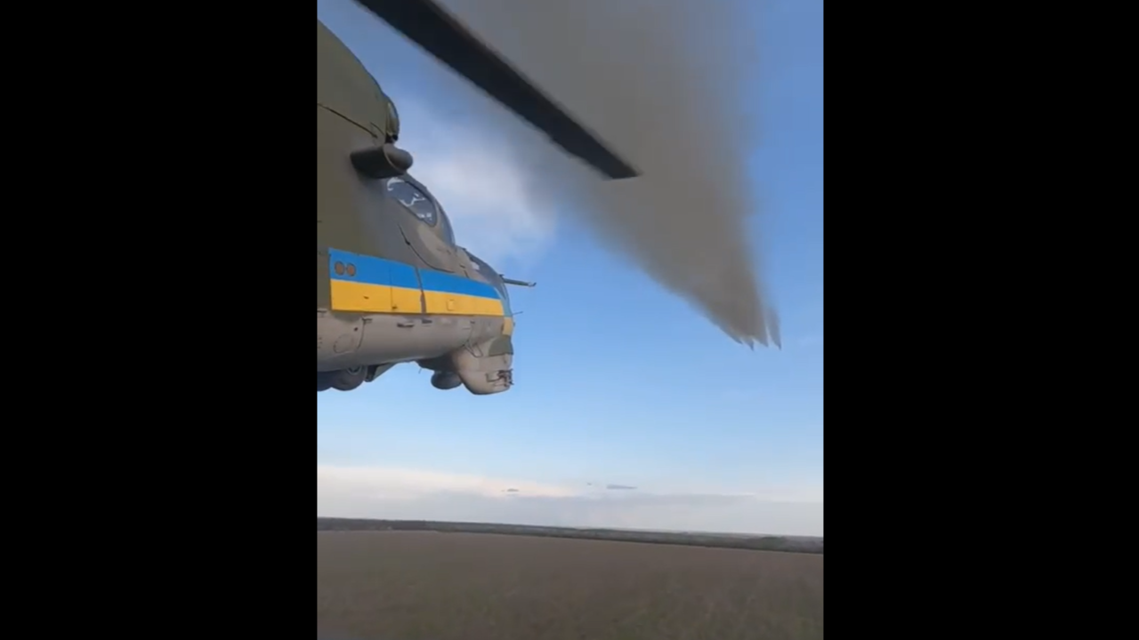 Ukrainian Mi-24 Helicopter Launching Rockets