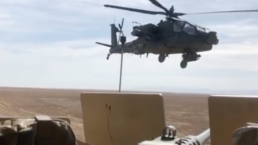 Apache Gunship Buzzes US Convoy In Syria